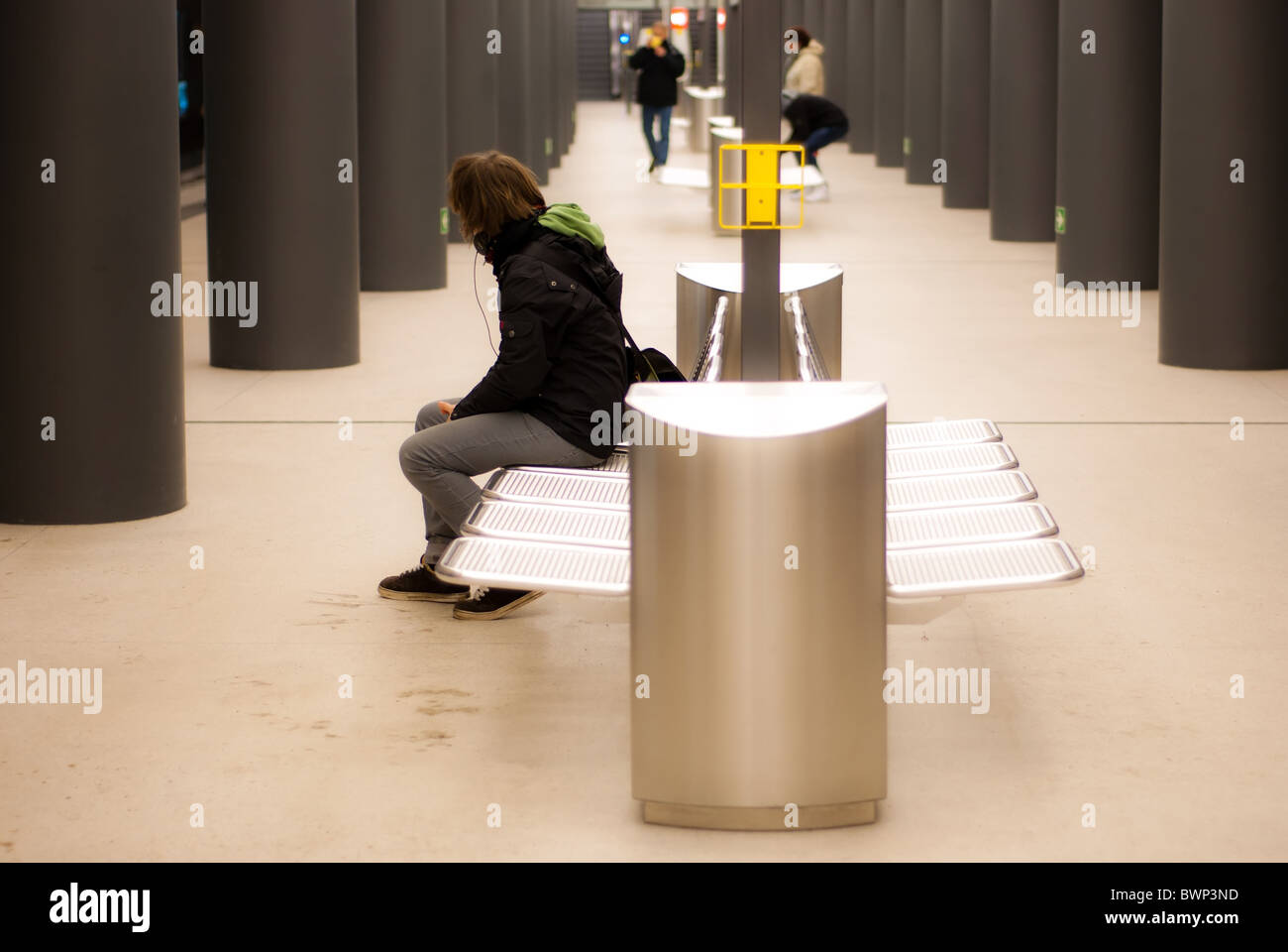 Person waiting at the station for the train Stock Photo - Alamy