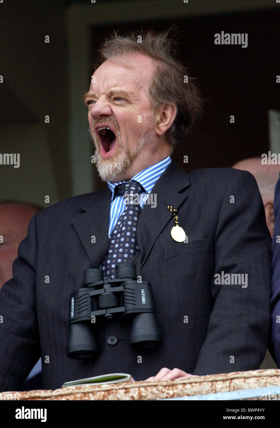 Former Foreign Secretary Robin Cook yawning while watching the racing ...