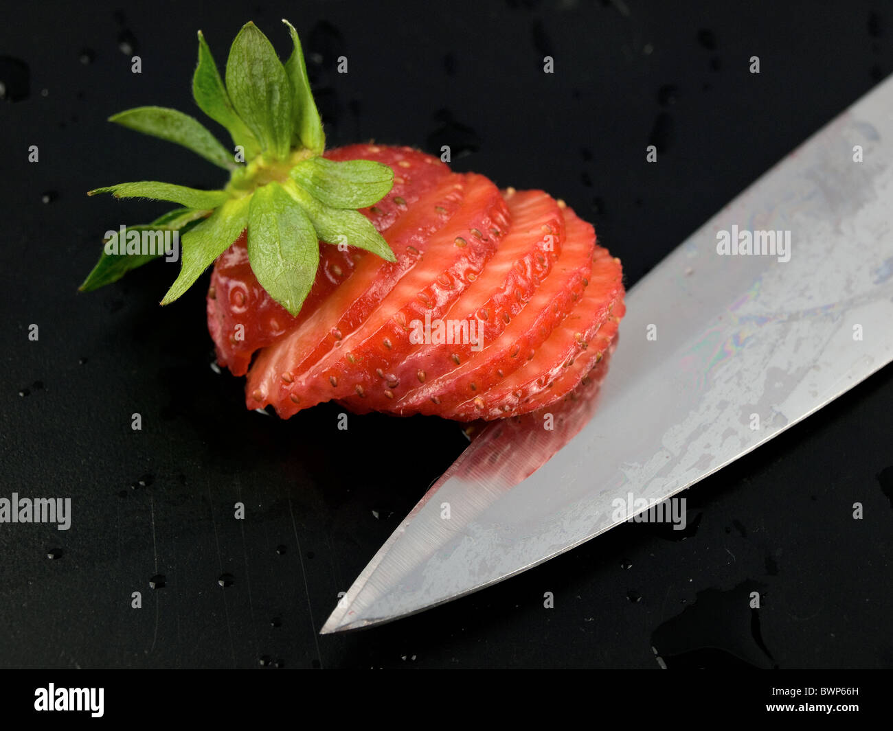 Strawberry slice hi-res stock photography and images - Alamy