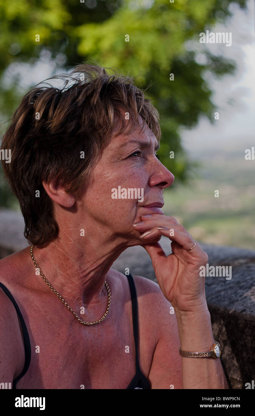 woman looking pensive Stock Photo - Alamy