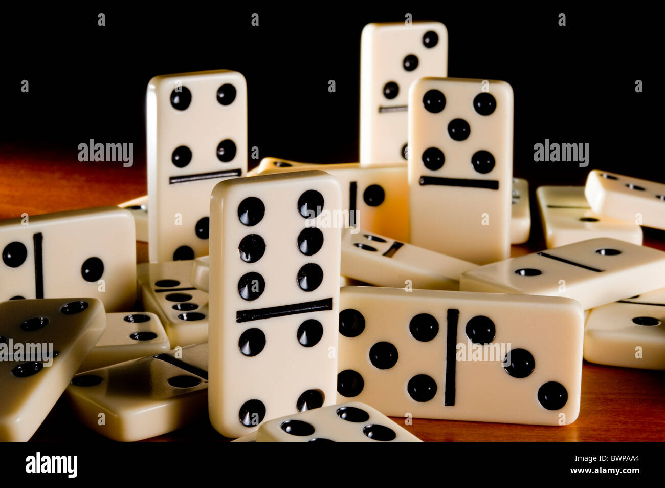 dominoes tiles scattered Stock Photo - Alamy