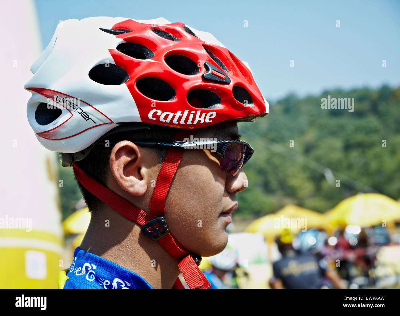 Cyclist safety helmet worn by a young cross country competitor Stock ...