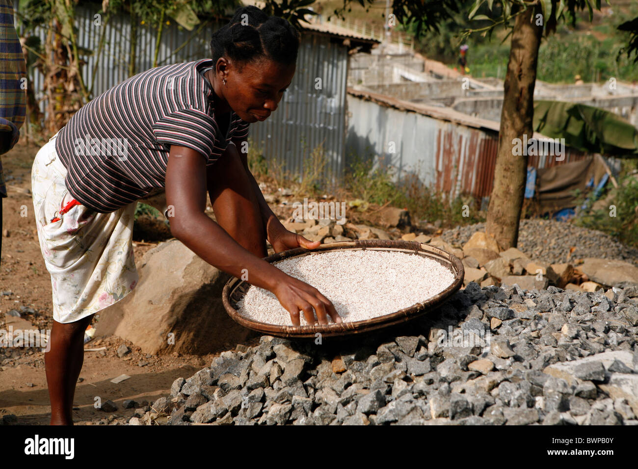 Hard labour breaking rocks hi-res stock photography and images - Alamy