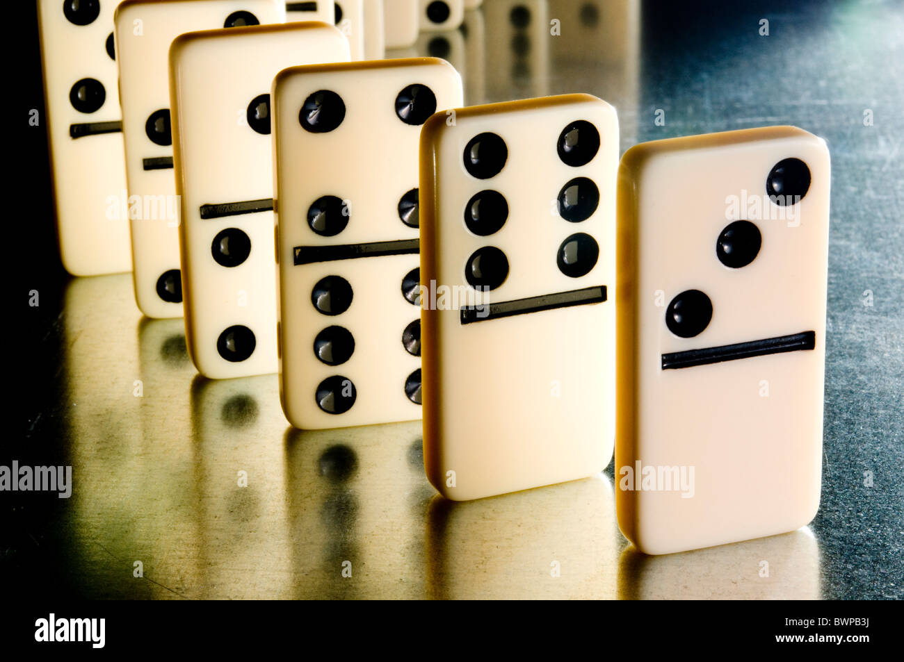 dominoes tiles in a row Stock Photo - Alamy