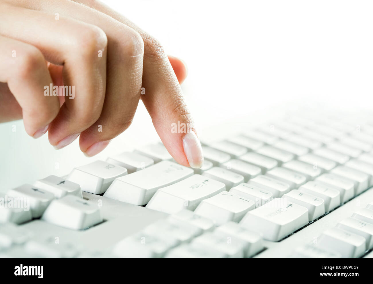 Image of female forefinger before pressing enter key Stock Photo - Alamy