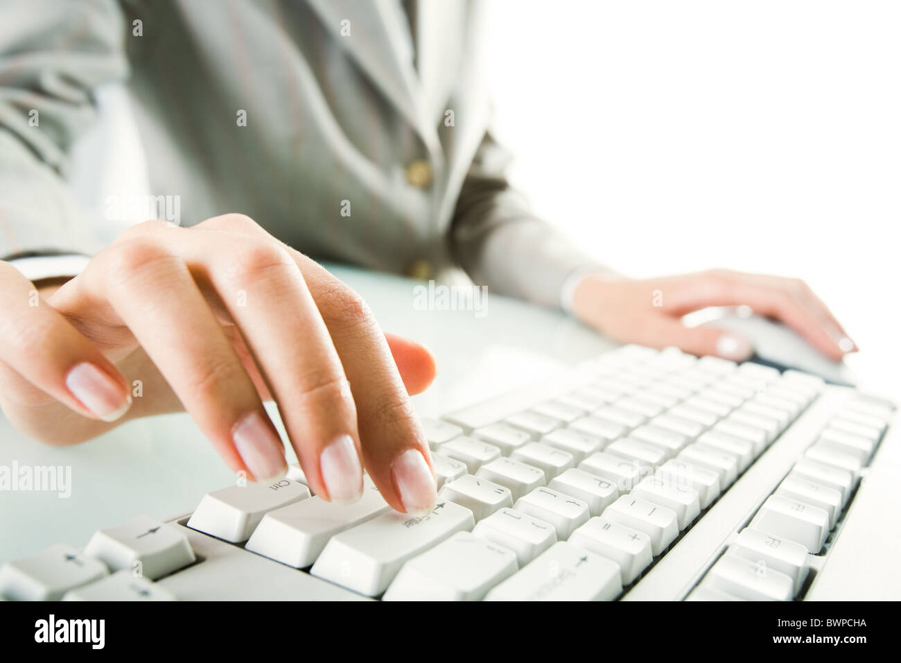 Image of female fingers over enter key Stock Photo - Alamy