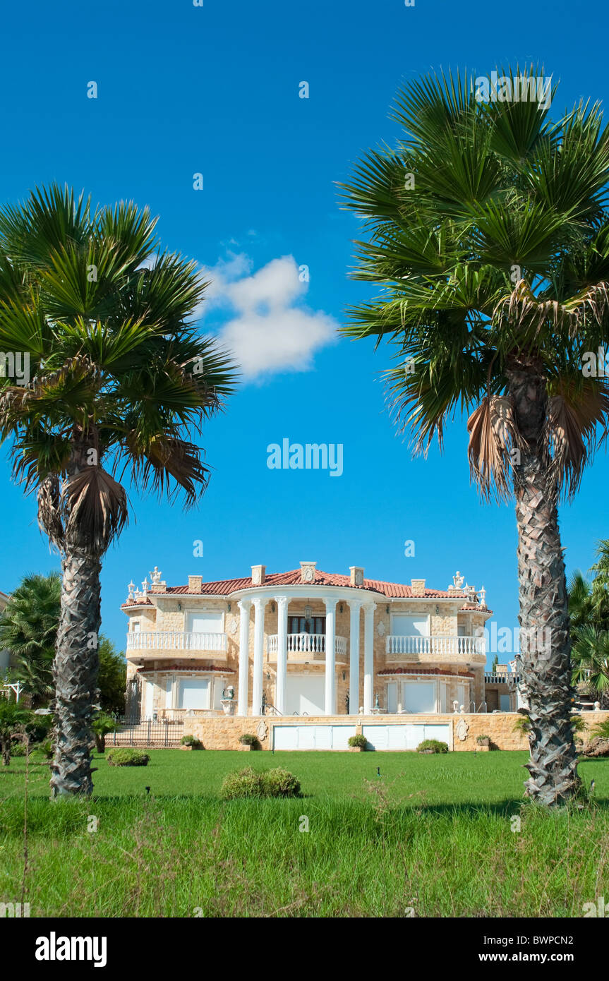 Huge beautiful house among the palms on the island of Cyprus, summer ...