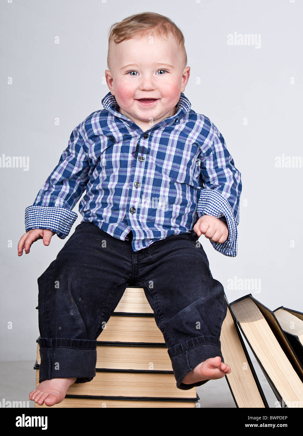 Baby book pile hi-res stock photography and images - Alamy