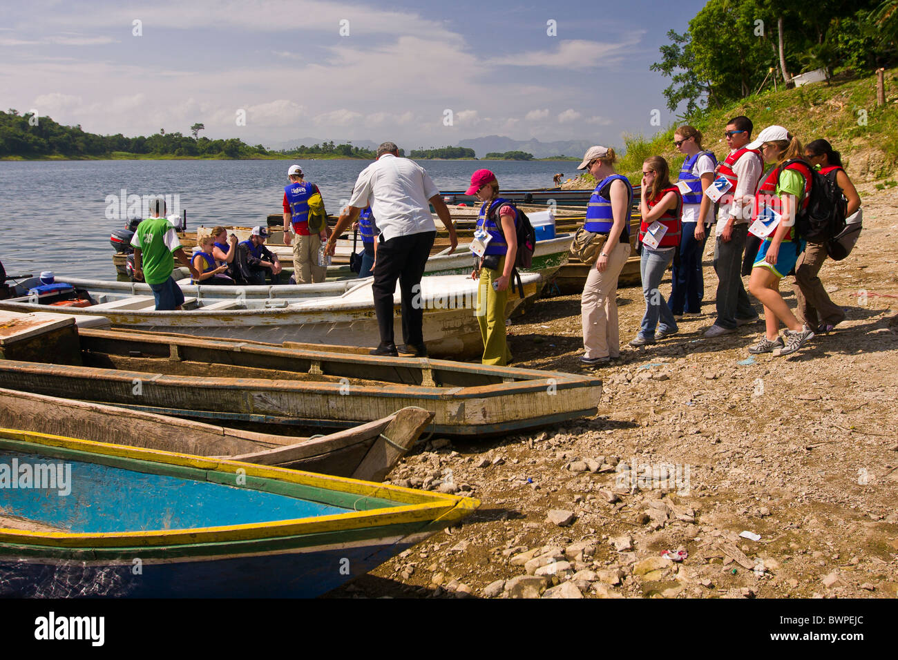 LAKE BAYANO, PANAMA - Tourists board boats, Village of Akua Yala, in ...