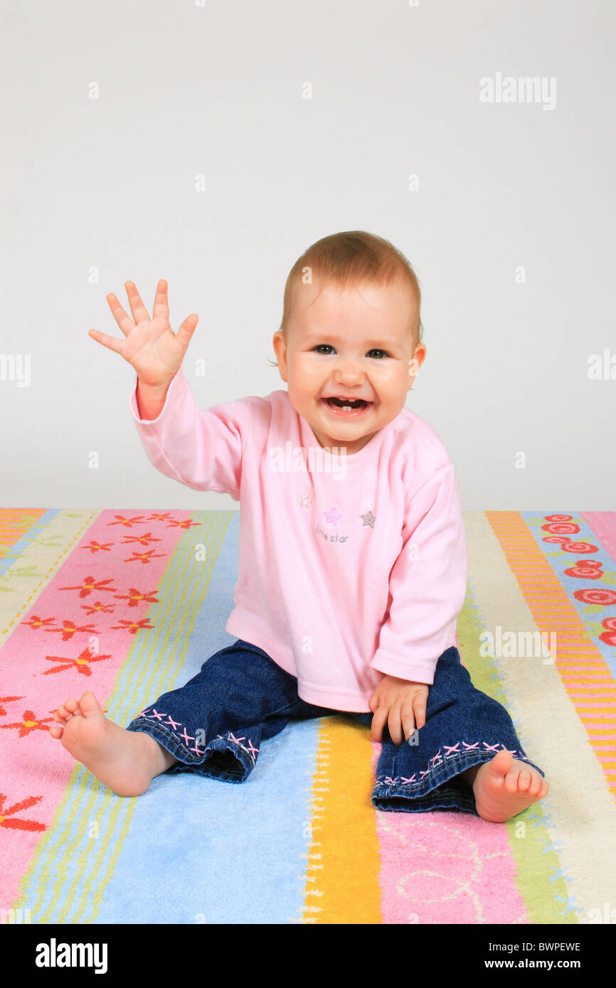 Baby Toddler Child Sitting Blanket Studio Indoor Smiling Joy Waving ...