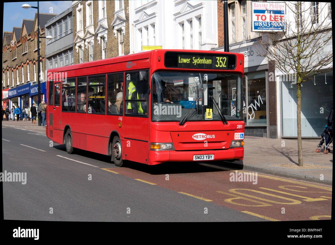 A red London single deck bus operated by Metrobus, part of the Go-Ahead ...