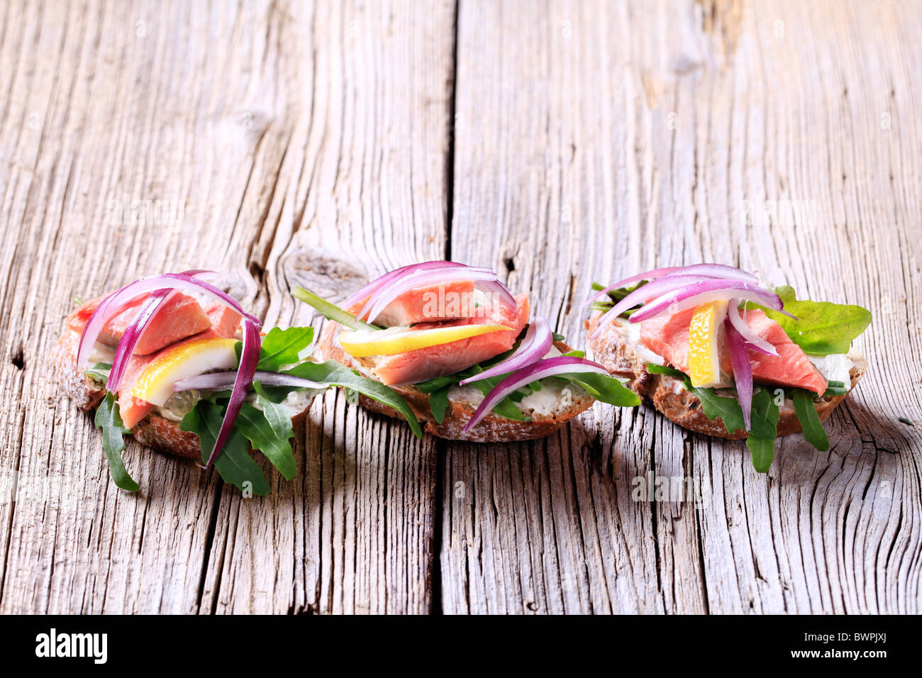 Salmon open faced sandwiches Stock Photo - Alamy
