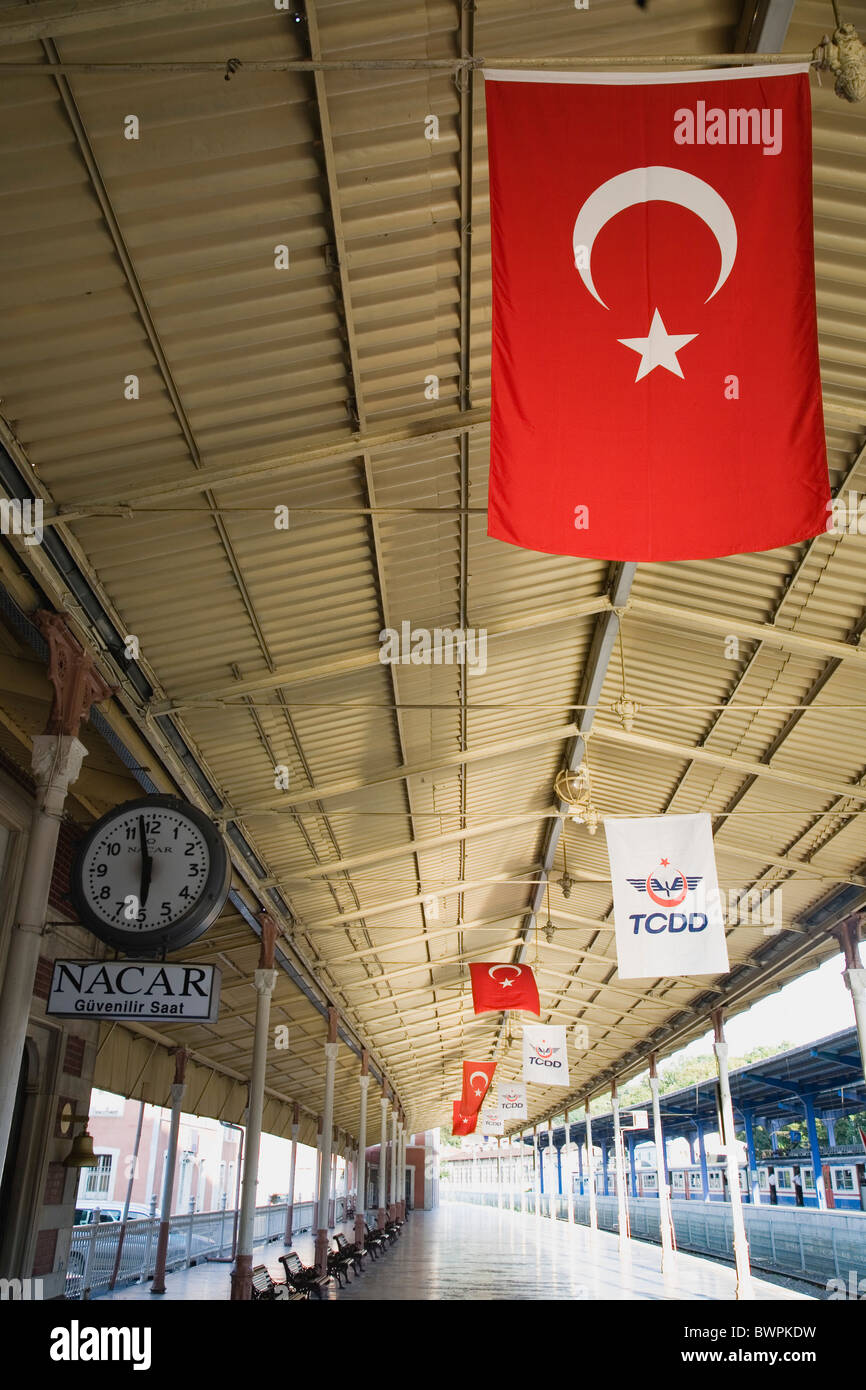 TURKEY Istanbul Sultanahmet Railway platform with Turkish flags hanging ...