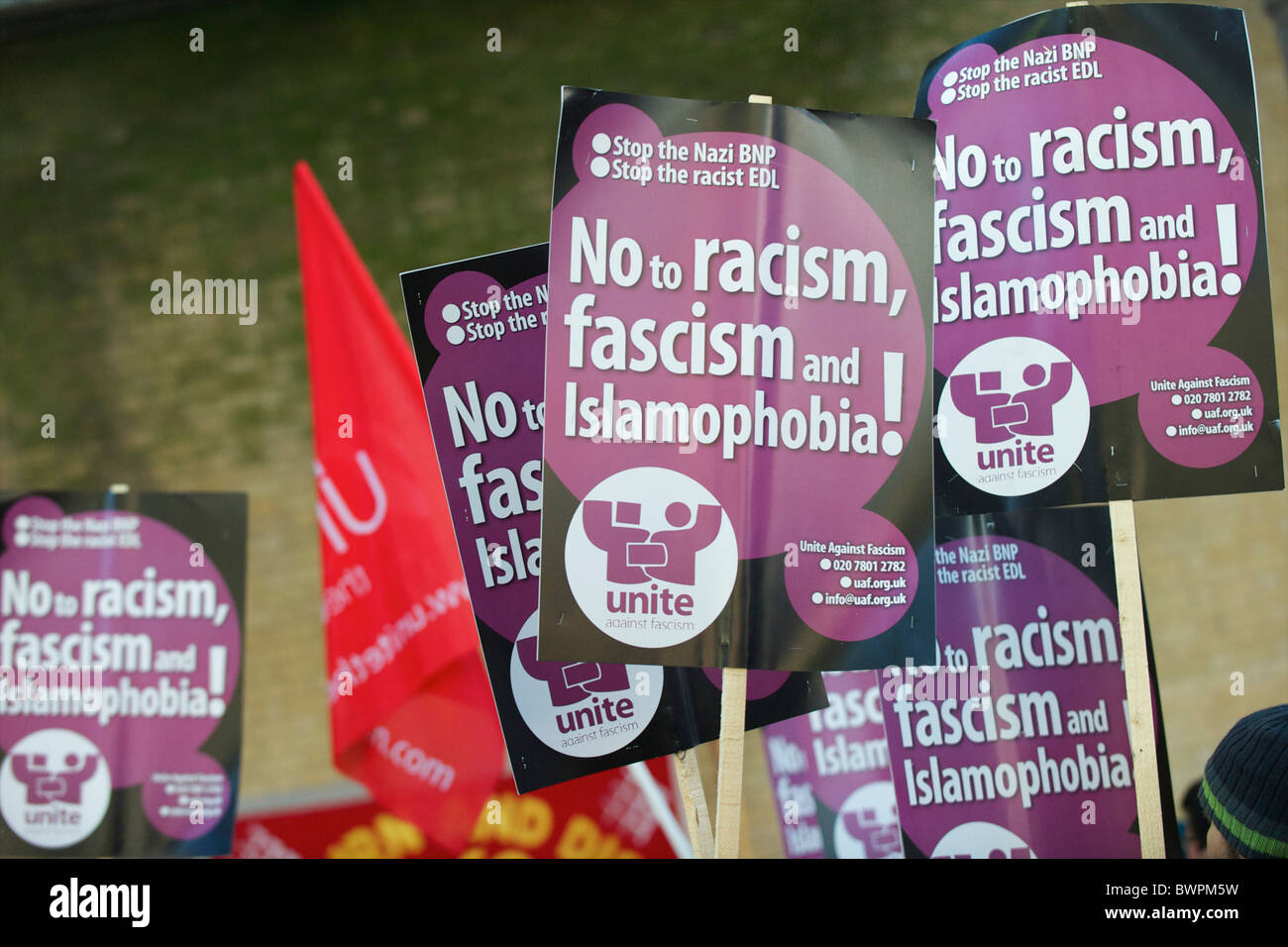 Members of Unite Against Facism (UAF) counter-protest against the ...