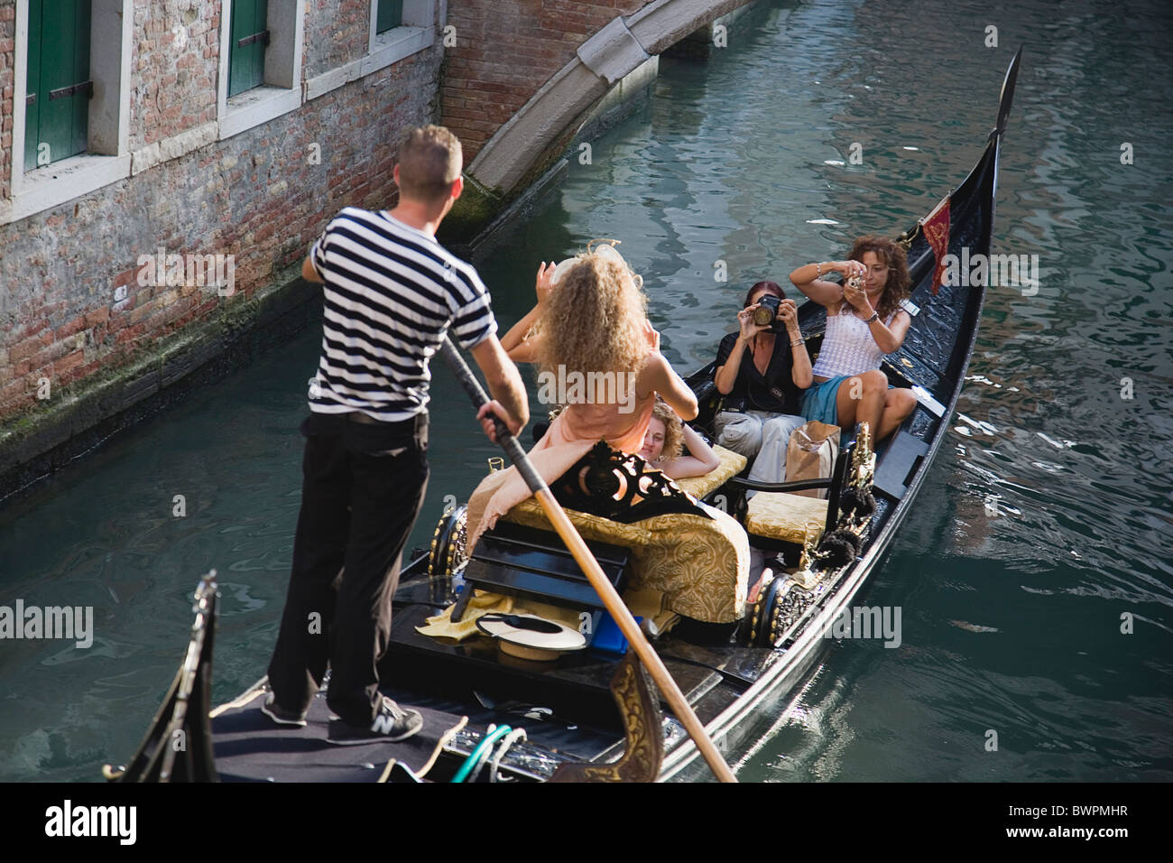 Female gondolier in venice hi-res stock photography and images - Alamy
