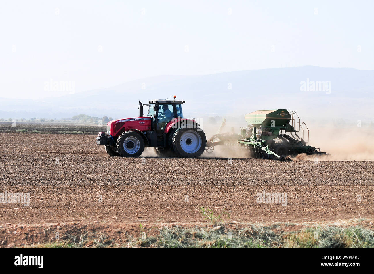 Israel, Hula Valley, Tractor ploughs and tills a field Stock Photo - Alamy
