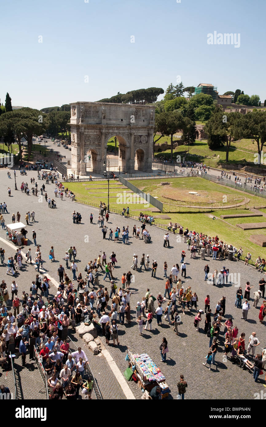 Crowds and queues at Rome's Colosseum. (in the background is the Arch ...