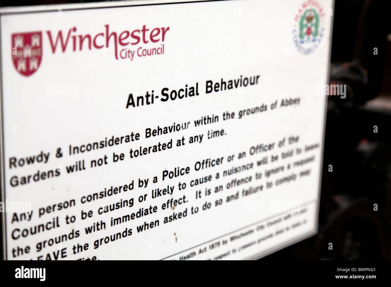 anti social behaviour warning sign Stock Photo - Alamy