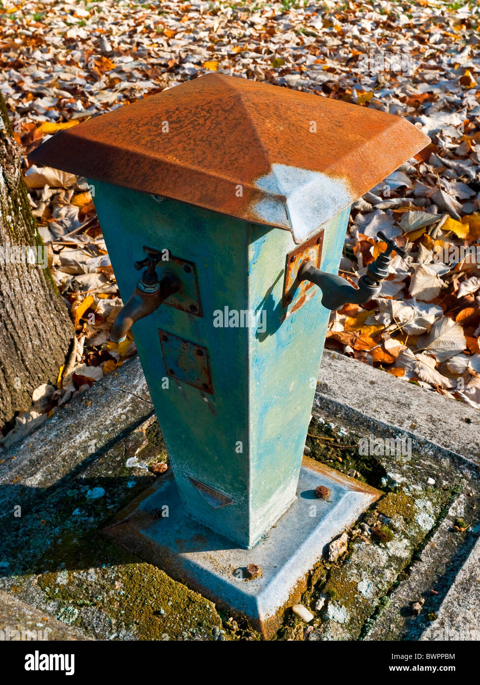 Old outside water taps on camping site - France Stock Photo - Alamy