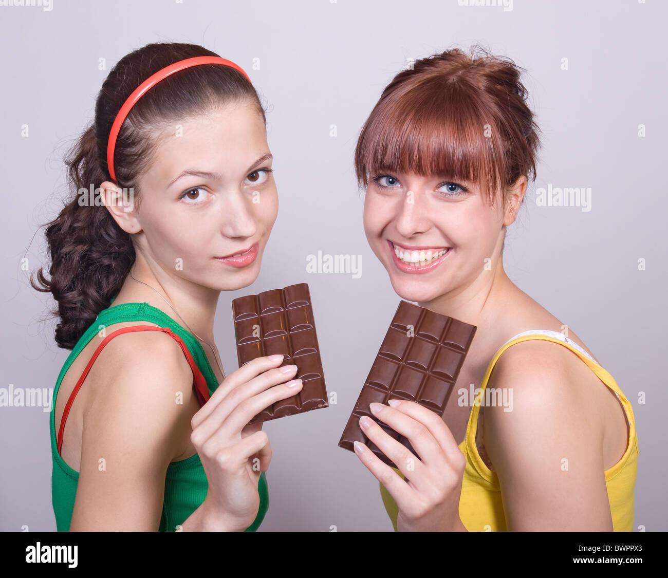 two girls with chocolate Stock Photo - Alamy