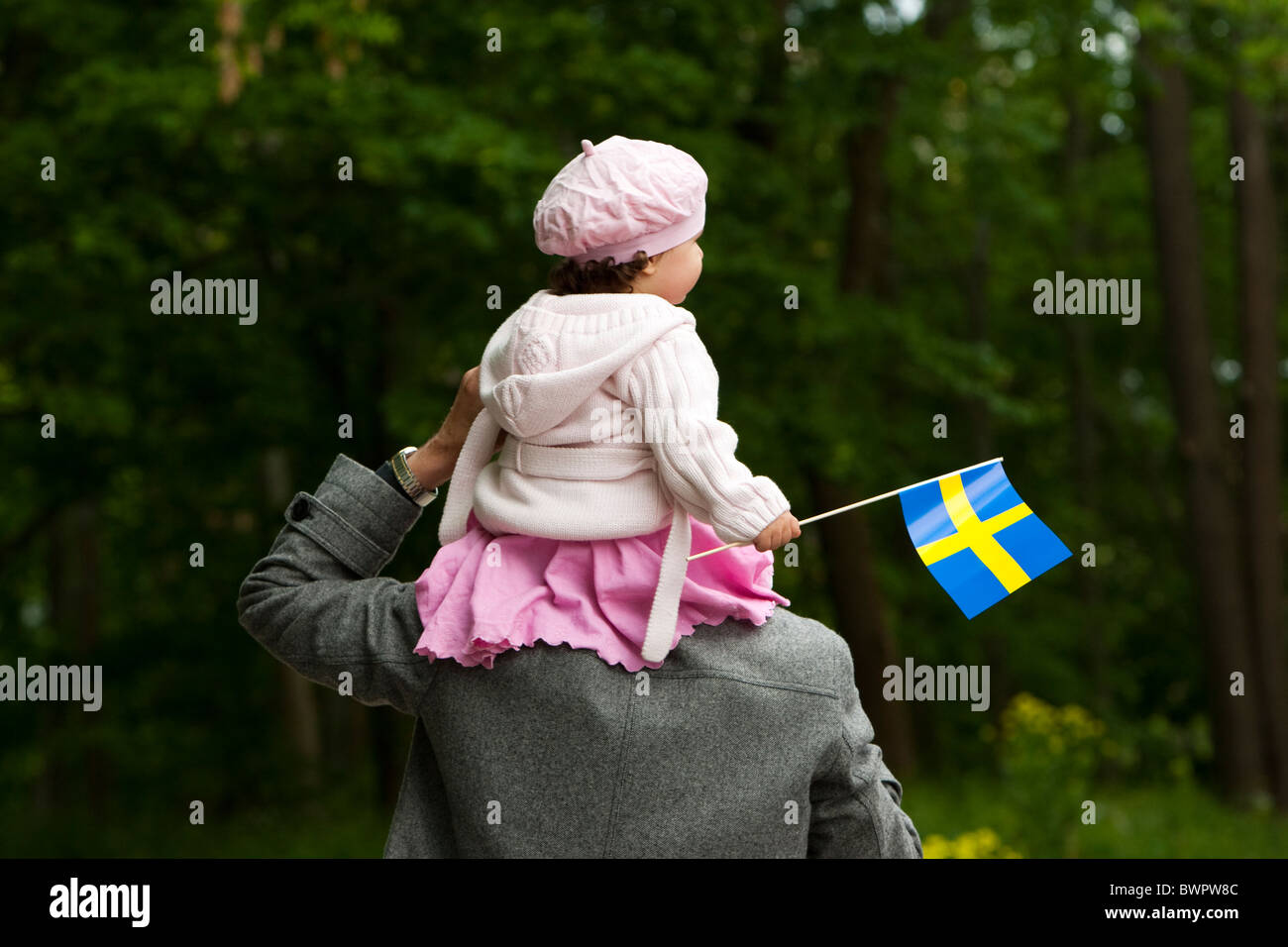 Child with Swedish flag Stock Photo - Alamy