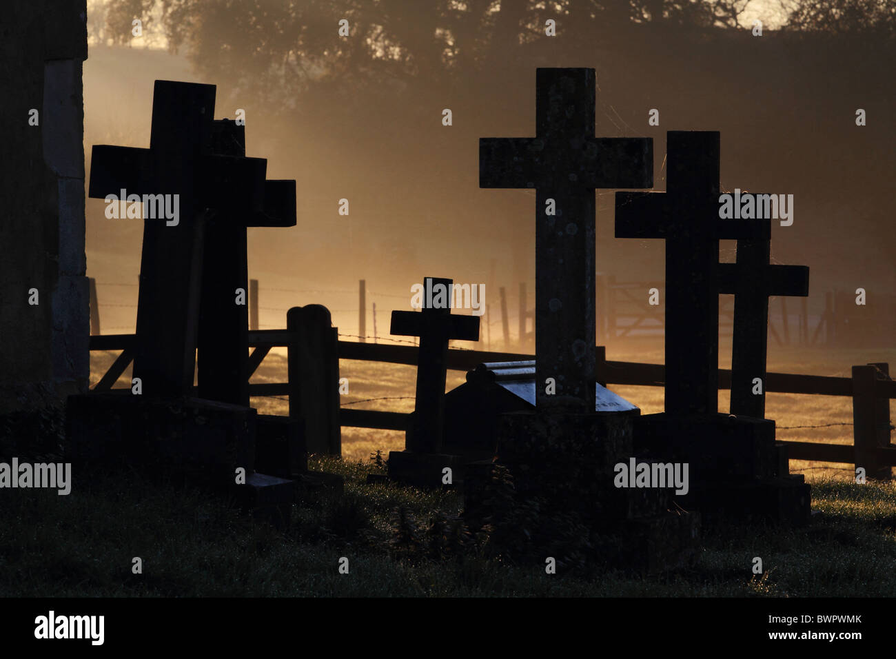 Graveyard mist gravestones churchyard misty remembrance Stock Photo - Alamy