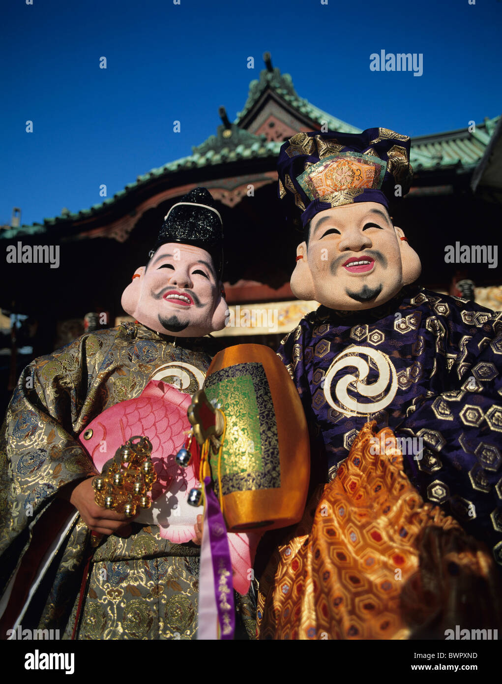 Figures in traditional japanese attire hi-res stock photography and ...