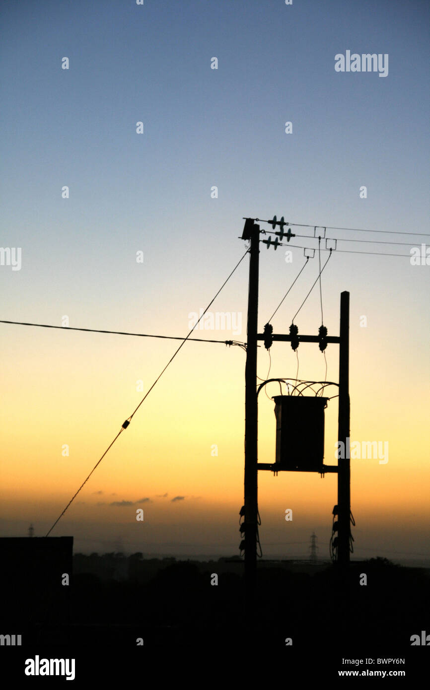 silhouette of electricity power lines at sunset Stock Photo - Alamy