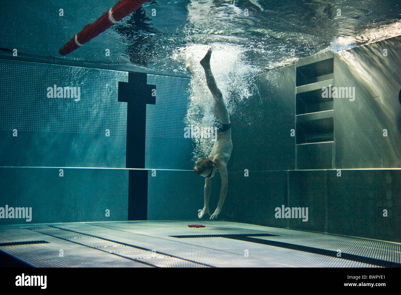 boy diving underwater on swimming pool Stock Photo - Alamy
