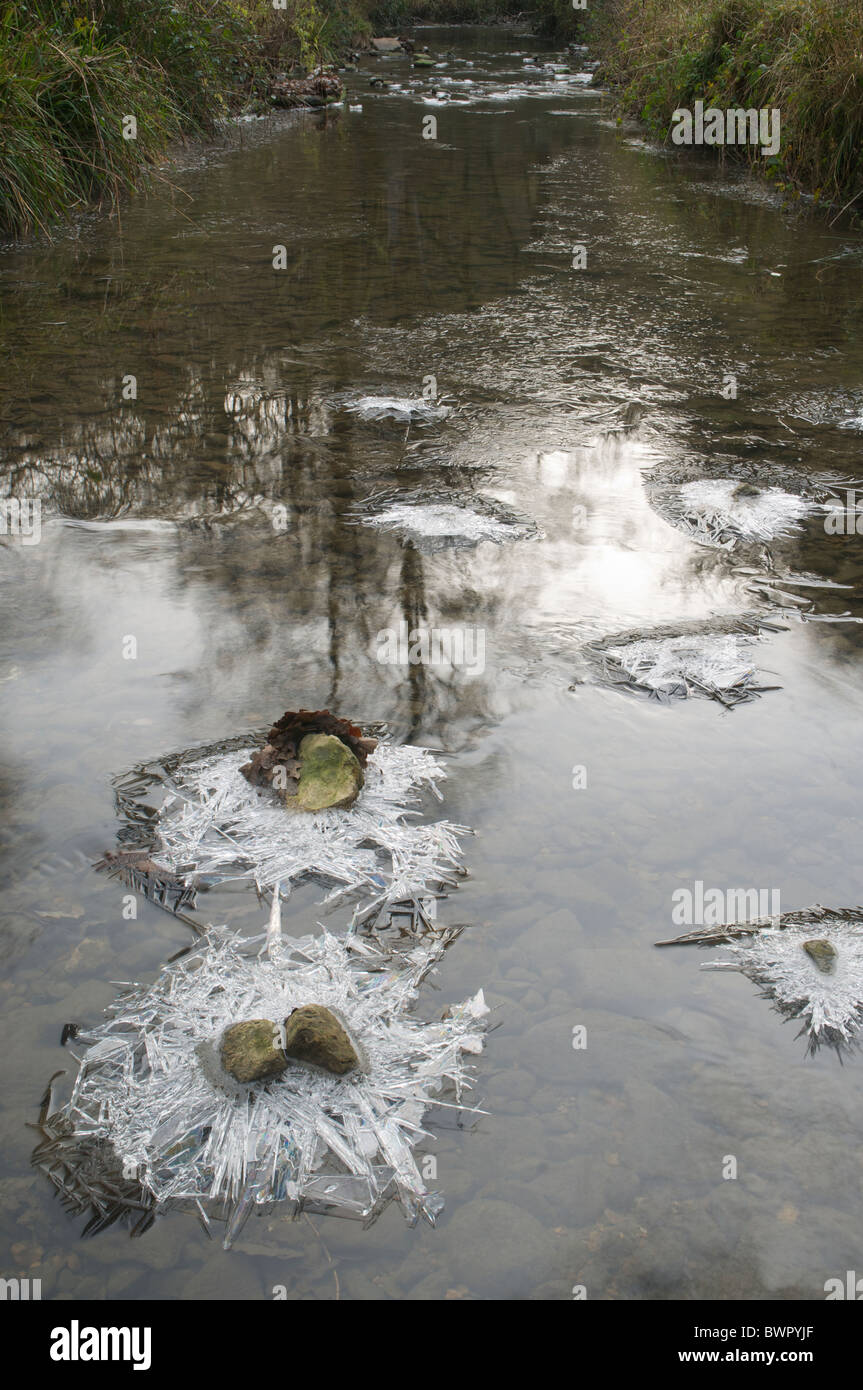 Ice in an English stream Stock Photo - Alamy