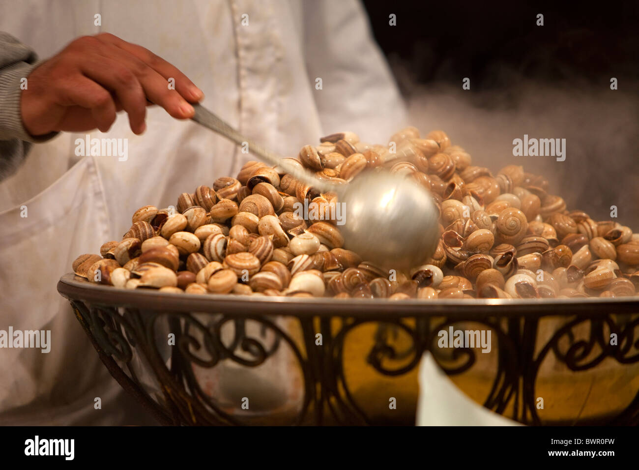 Boiled snails in soup for sale, Djemma El Fna, Marrakesh, Morocco Stock ...