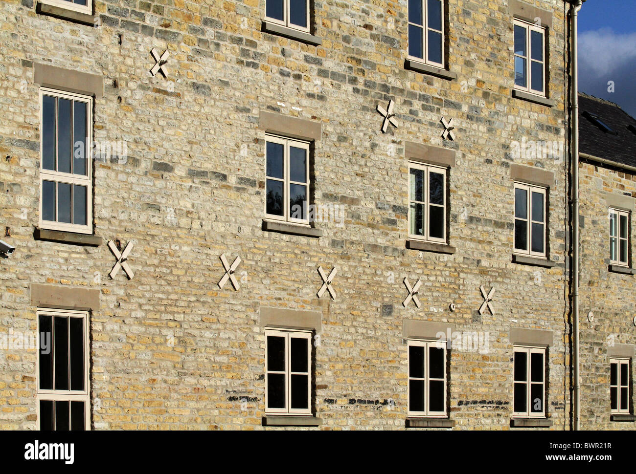 Old mill building converted to high quality residential flats and walls ...