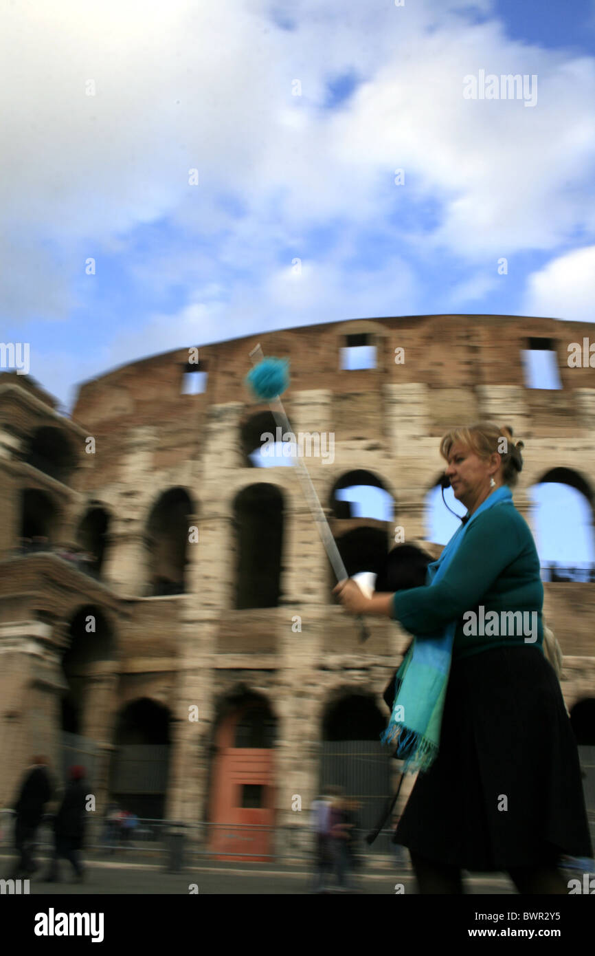 tour guide outside the colosseum, rome Stock Photo - Alamy