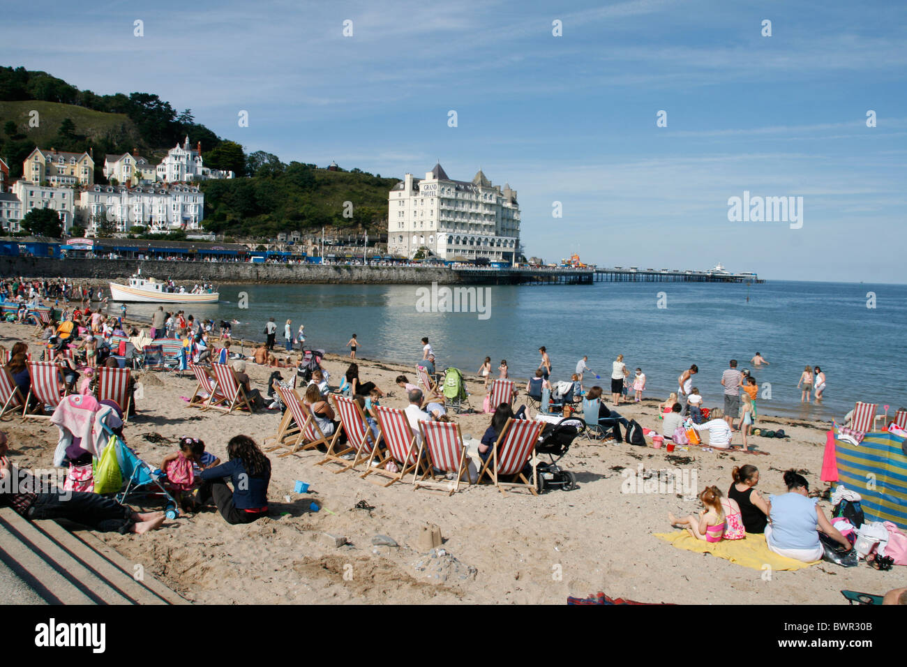 people on the beach in llandudno north wales uk Stock Photo - Alamy
