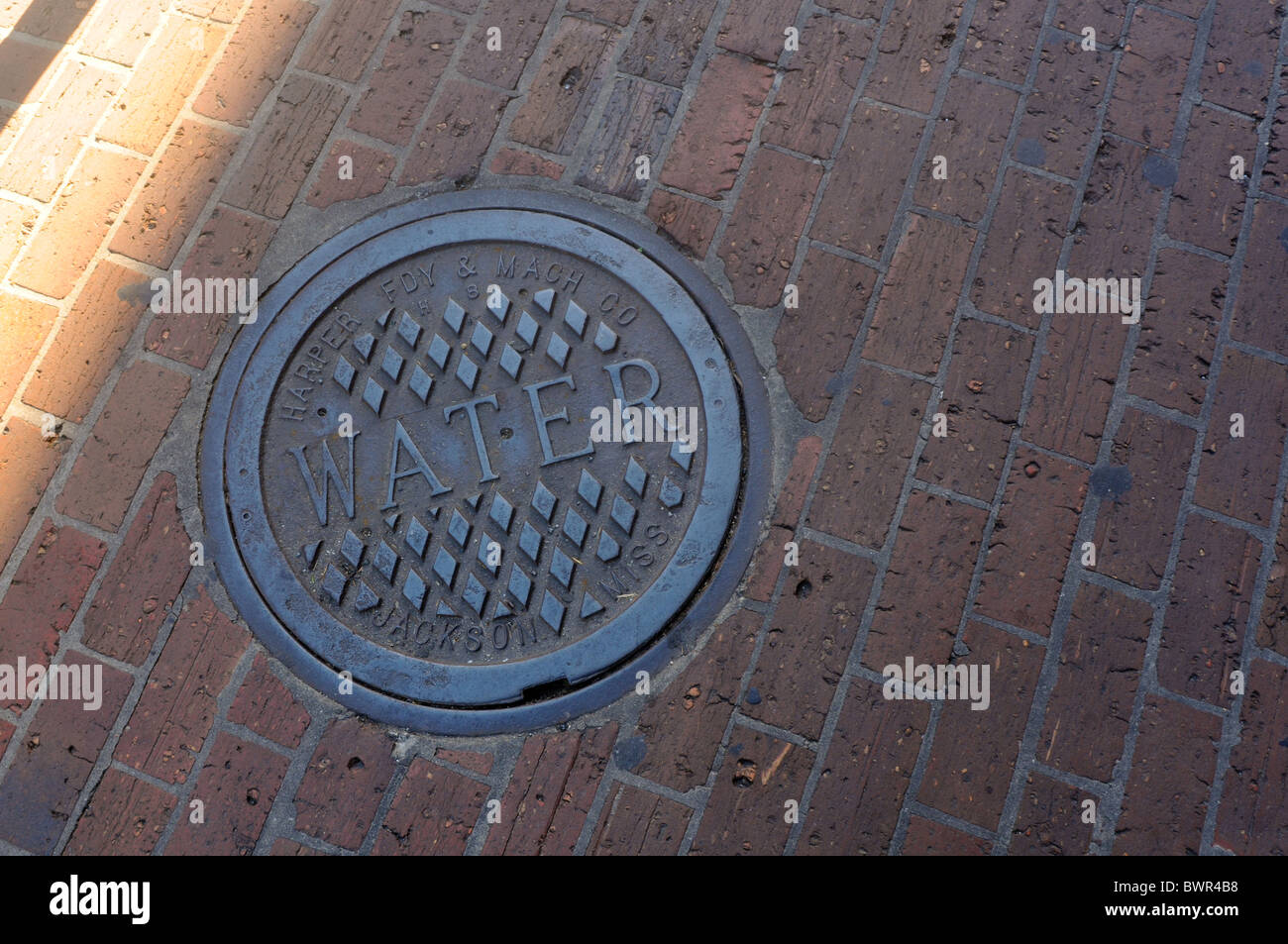 cover for municipal water supply on the street in New Orleans Stock ...