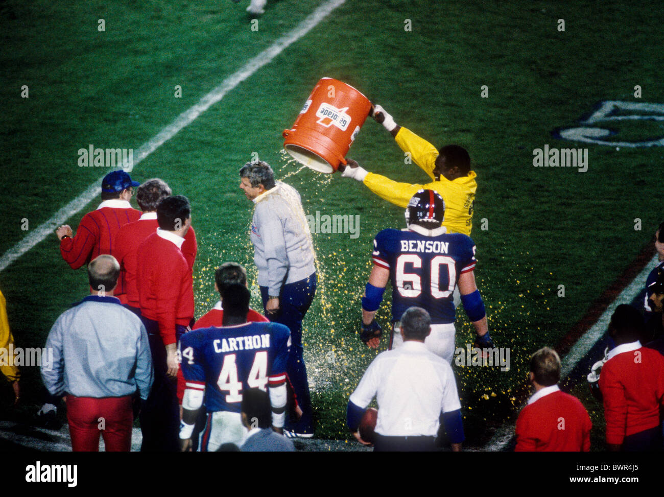 Harry Carson, New York Giants giving Coach Bill Parcells a Gatorade ...