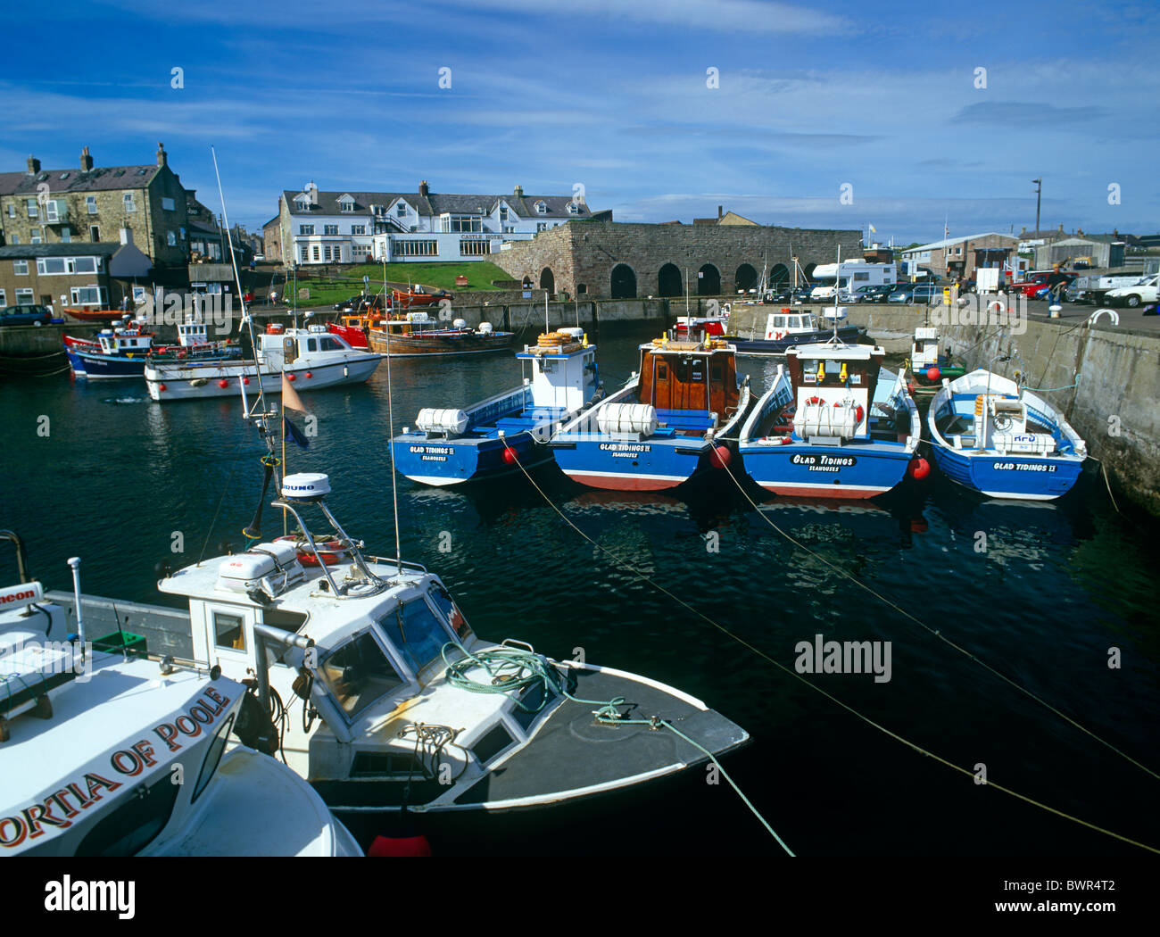 Fishing boats at the harbour at Seahouses, Northumberland coast ...