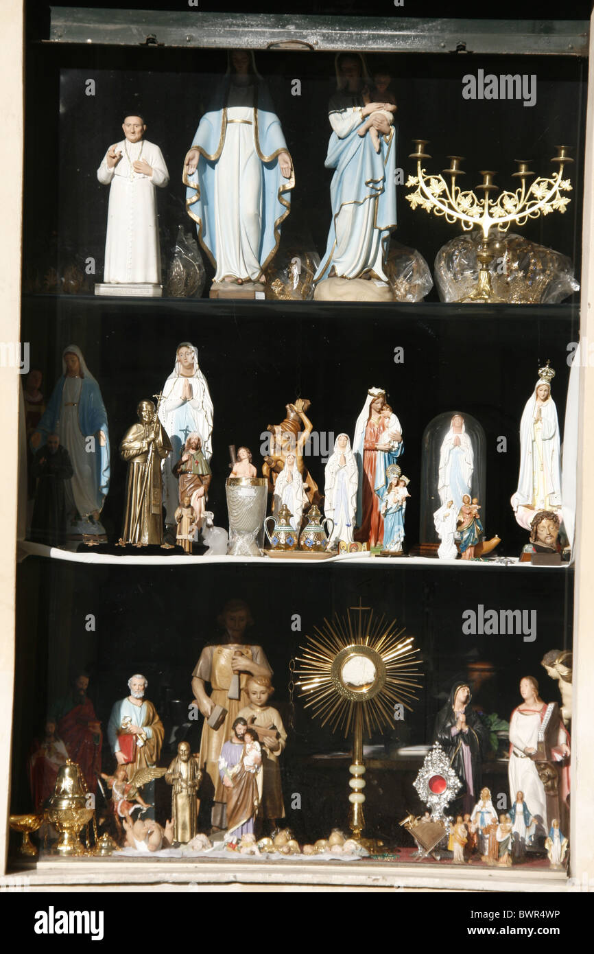 shop selling scared art religious models in rome Stock Photo - Alamy