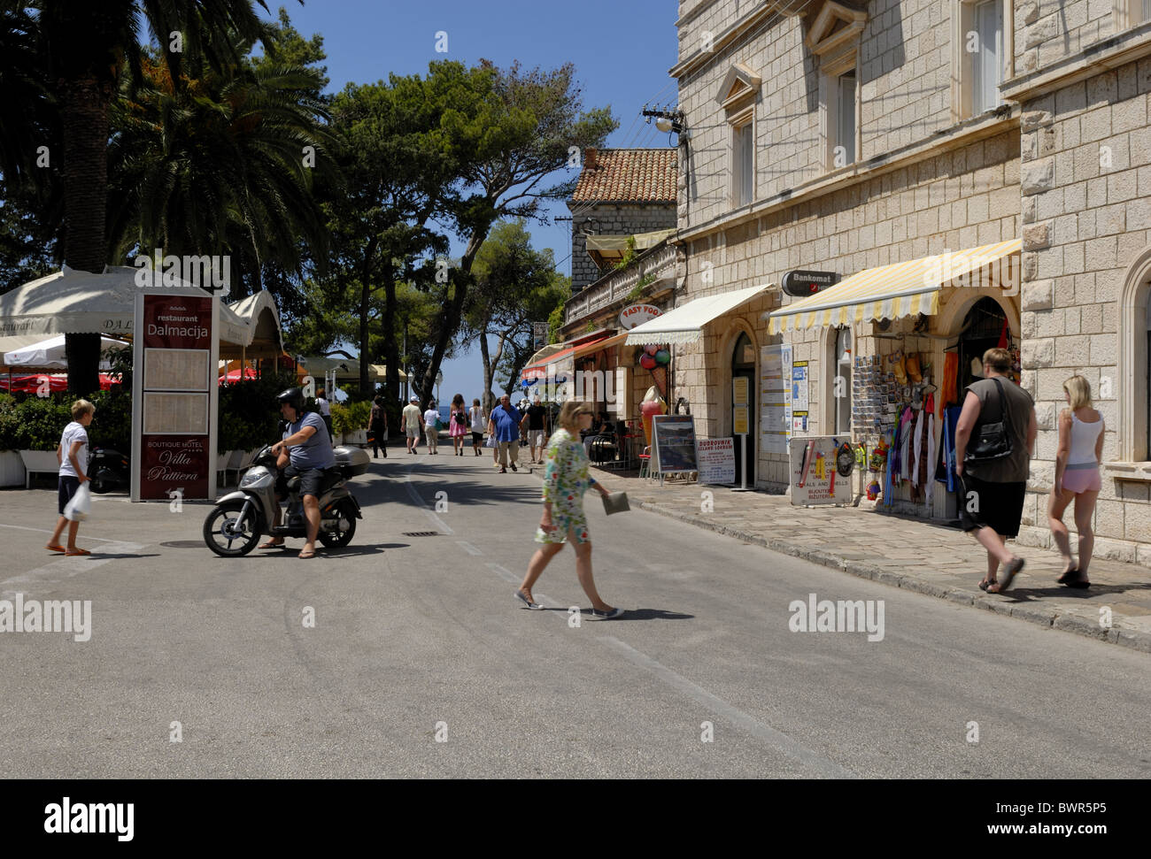 A fine view along Ravnica street in Cavtat Town. There are bars, shops ...