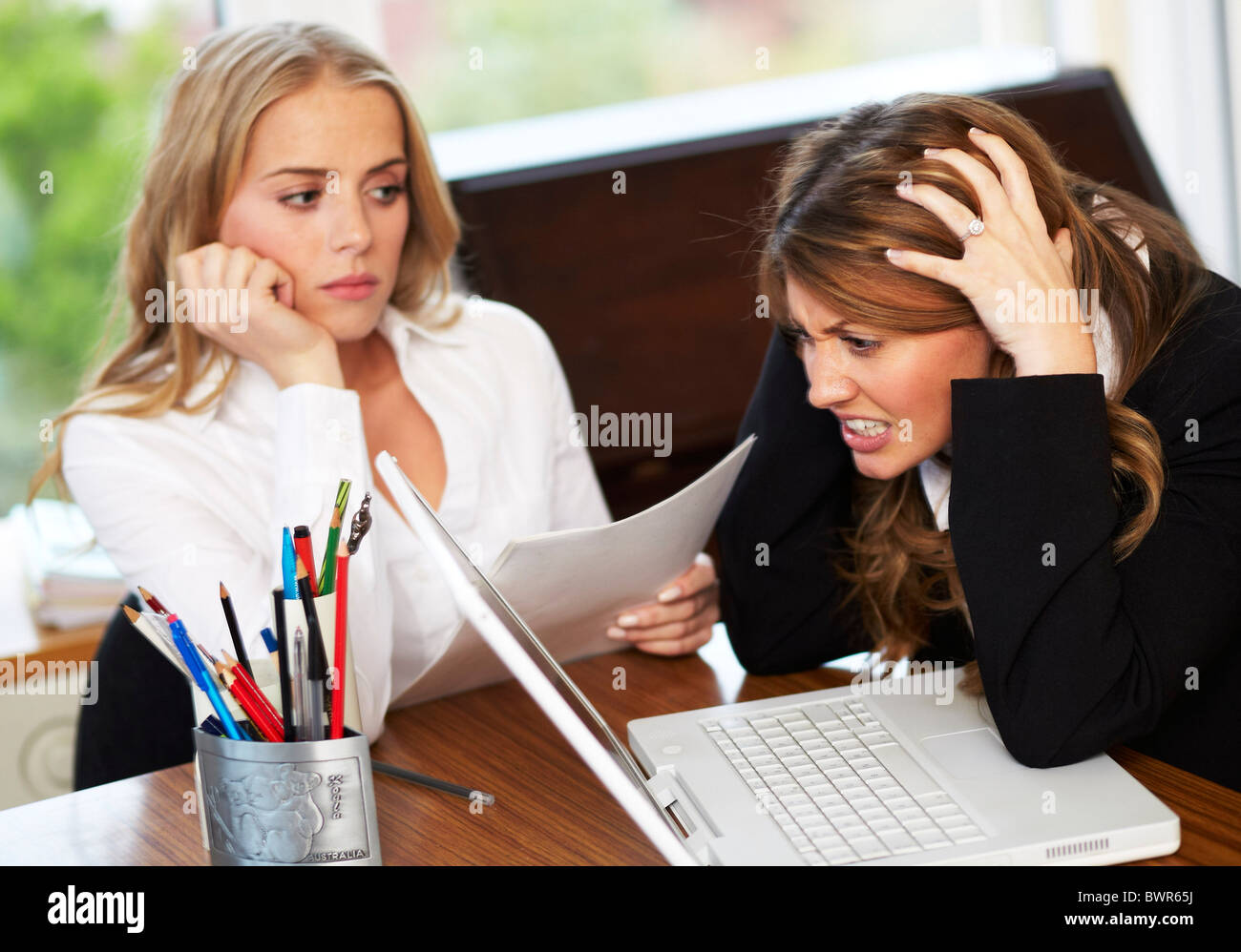 2 girls consoling Stock Photo - Alamy