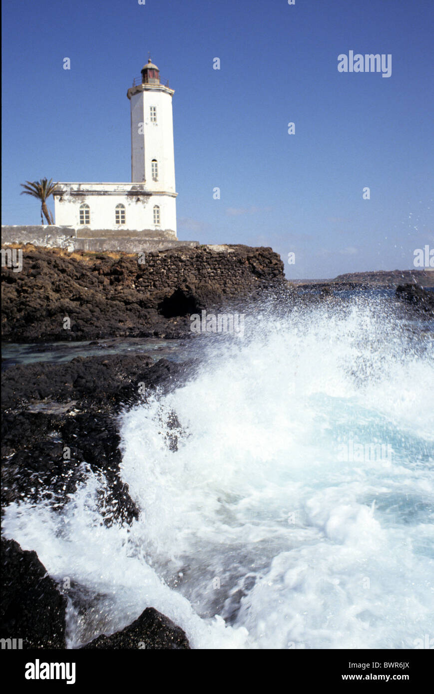 Cape Verde Santiago island Praia lighthouse coast shore waves sea spray ...