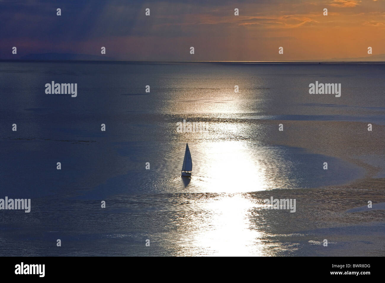 Ocean sailboat sailing boat sailing sea water surface reflection s ...