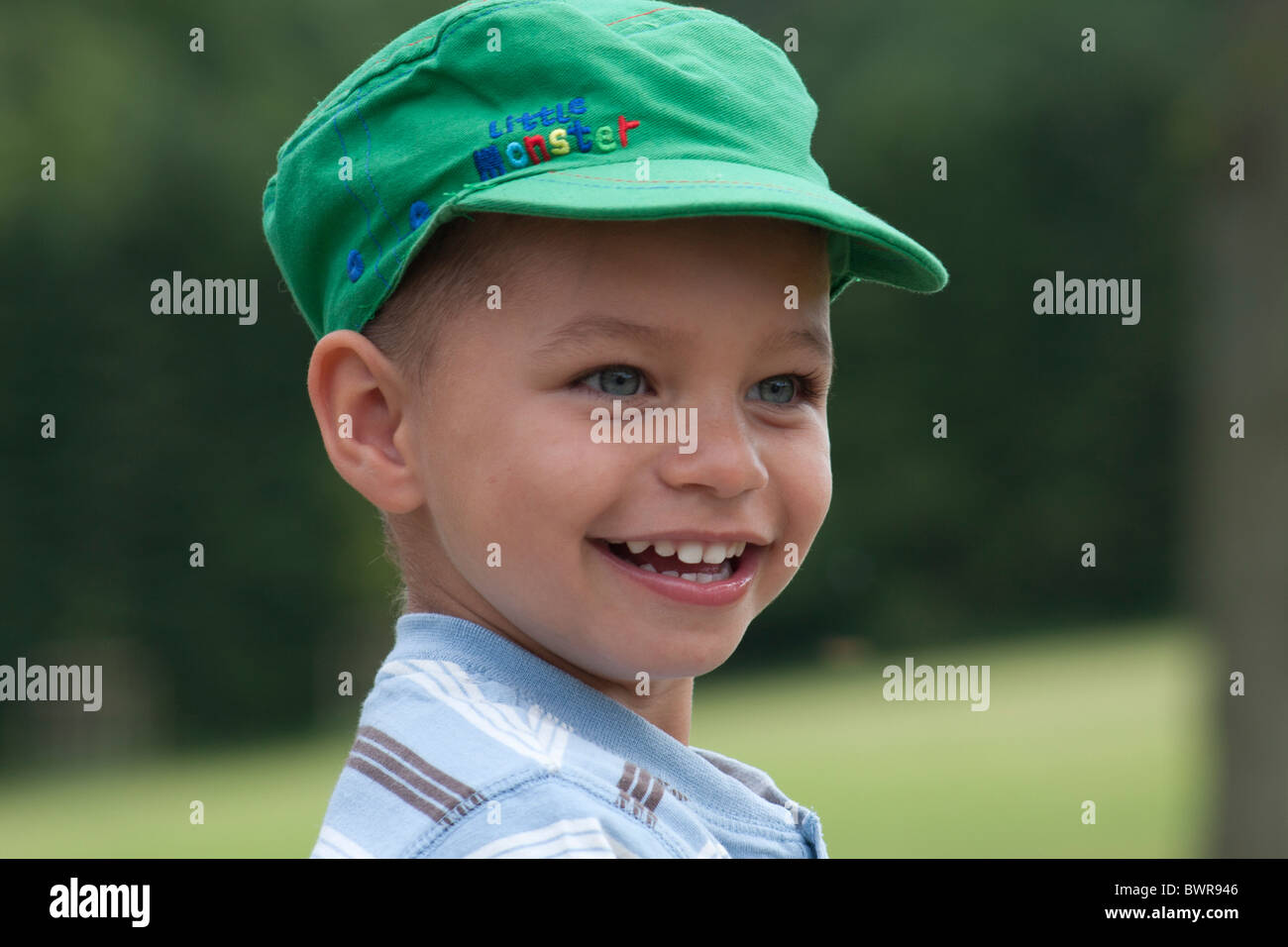 portrait little boy in green cap Stock Photo - Alamy
