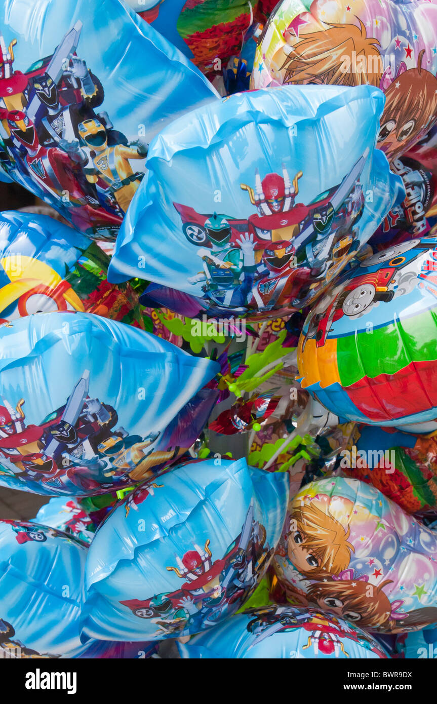 Helium cartoon characters balloons hi-res stock photography and images ...