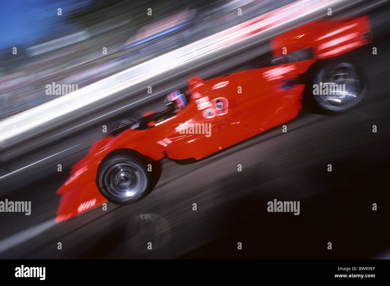 Blurred auto racing action Stock Photo - Alamy