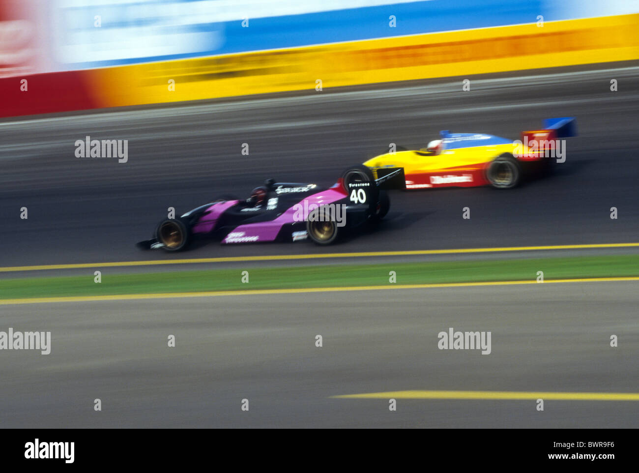 Blurred auto racing action Stock Photo - Alamy