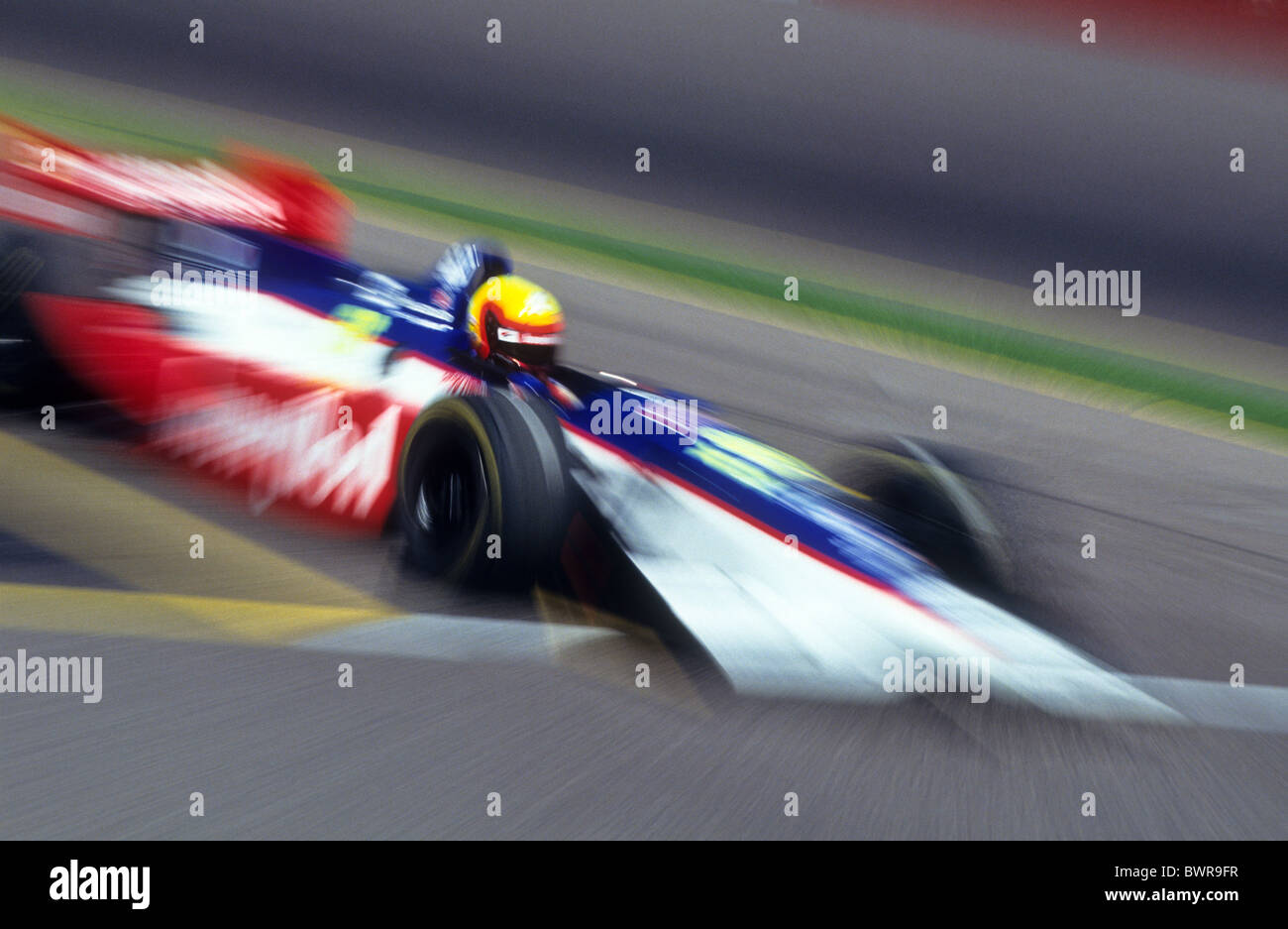 Blurred auto racing action Stock Photo - Alamy