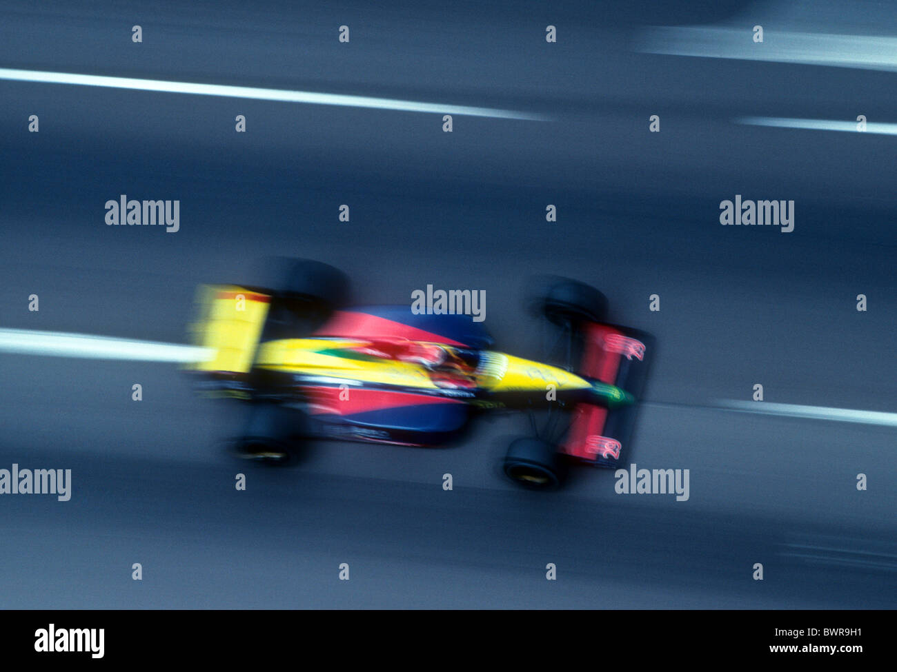 Blurred F1 auto racing action Stock Photo - Alamy