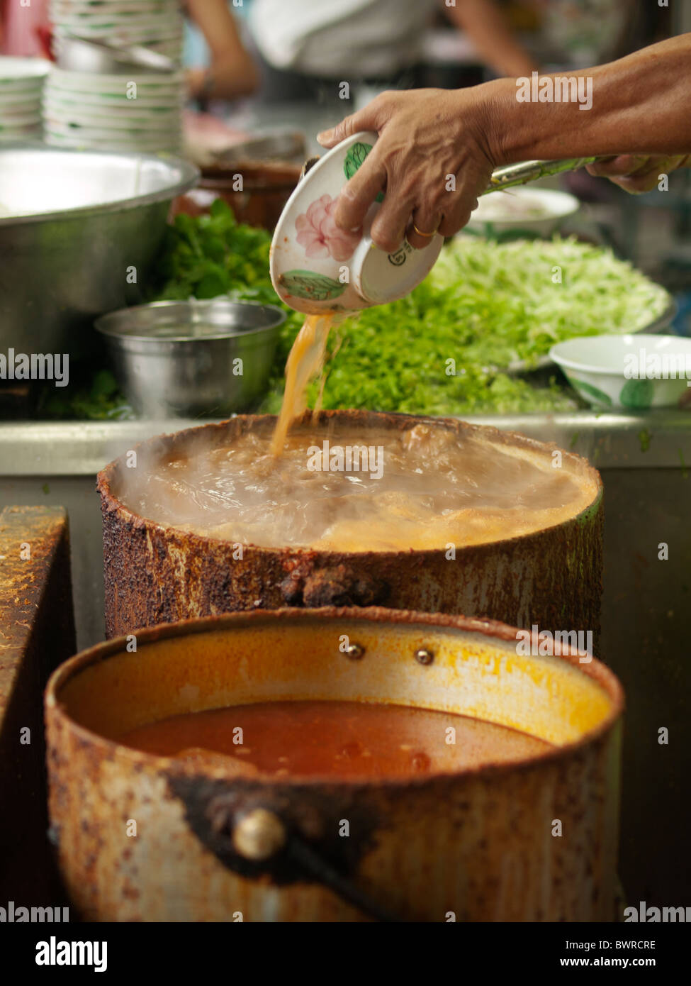 Asam laksa soup Stock Photo - Alamy