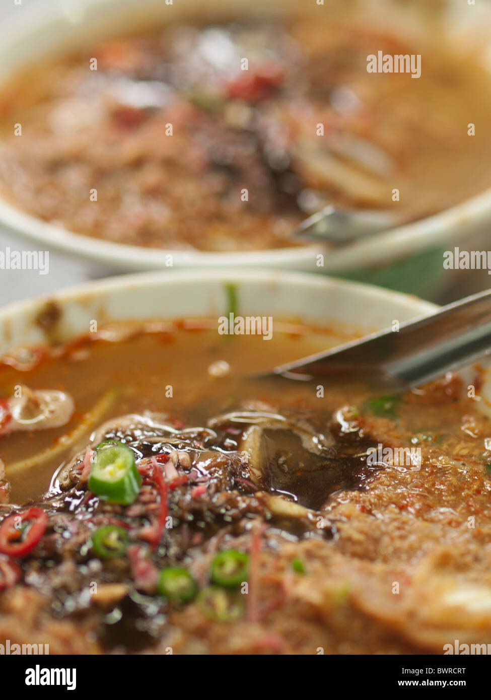 Asam laksa soup Stock Photo - Alamy